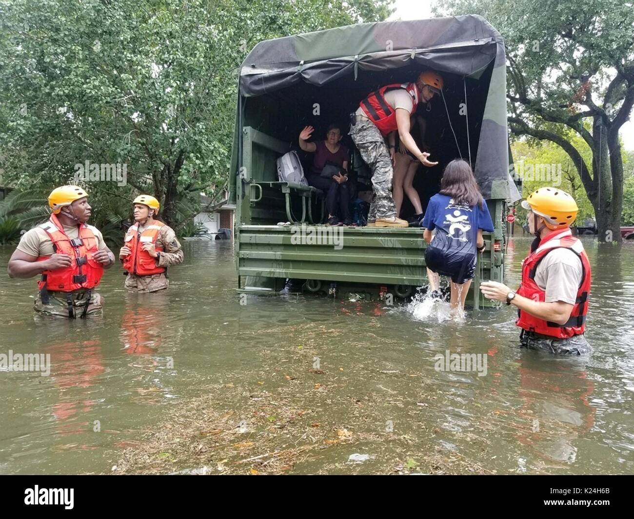National guardsmen rescue stranded residents after massive flooding ...
