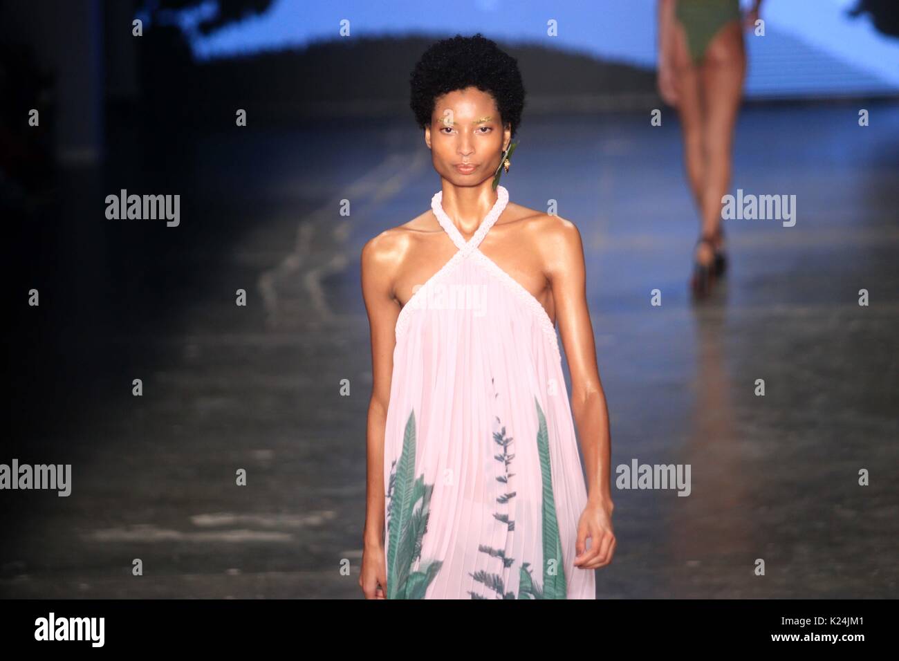 Sao Paulo, Brazil. 28th Aug, 2017. A model walks at Triya runway at ...