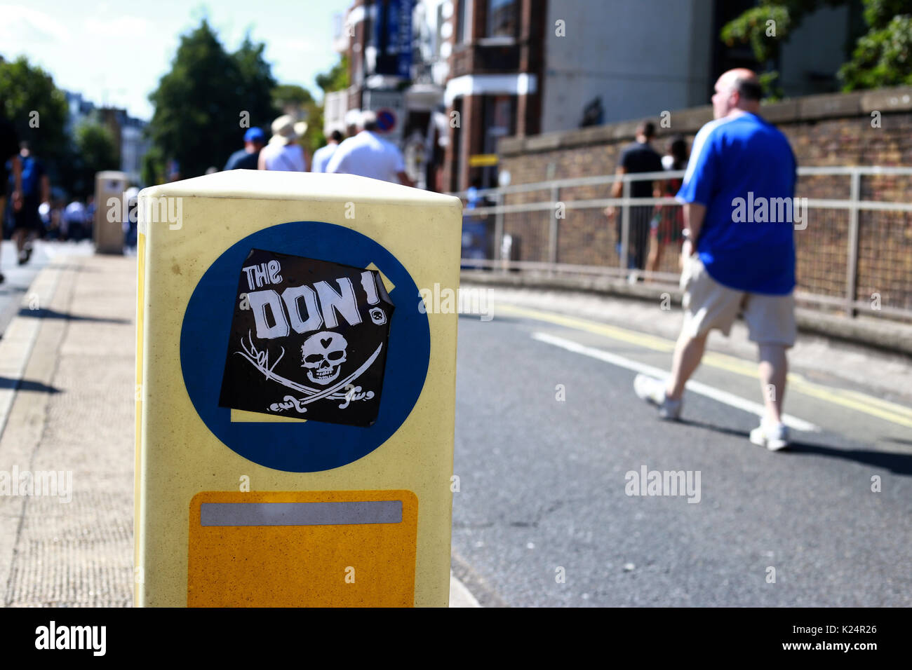A 'The Don' sticker on a road sign as Chelsea fans make their way ...