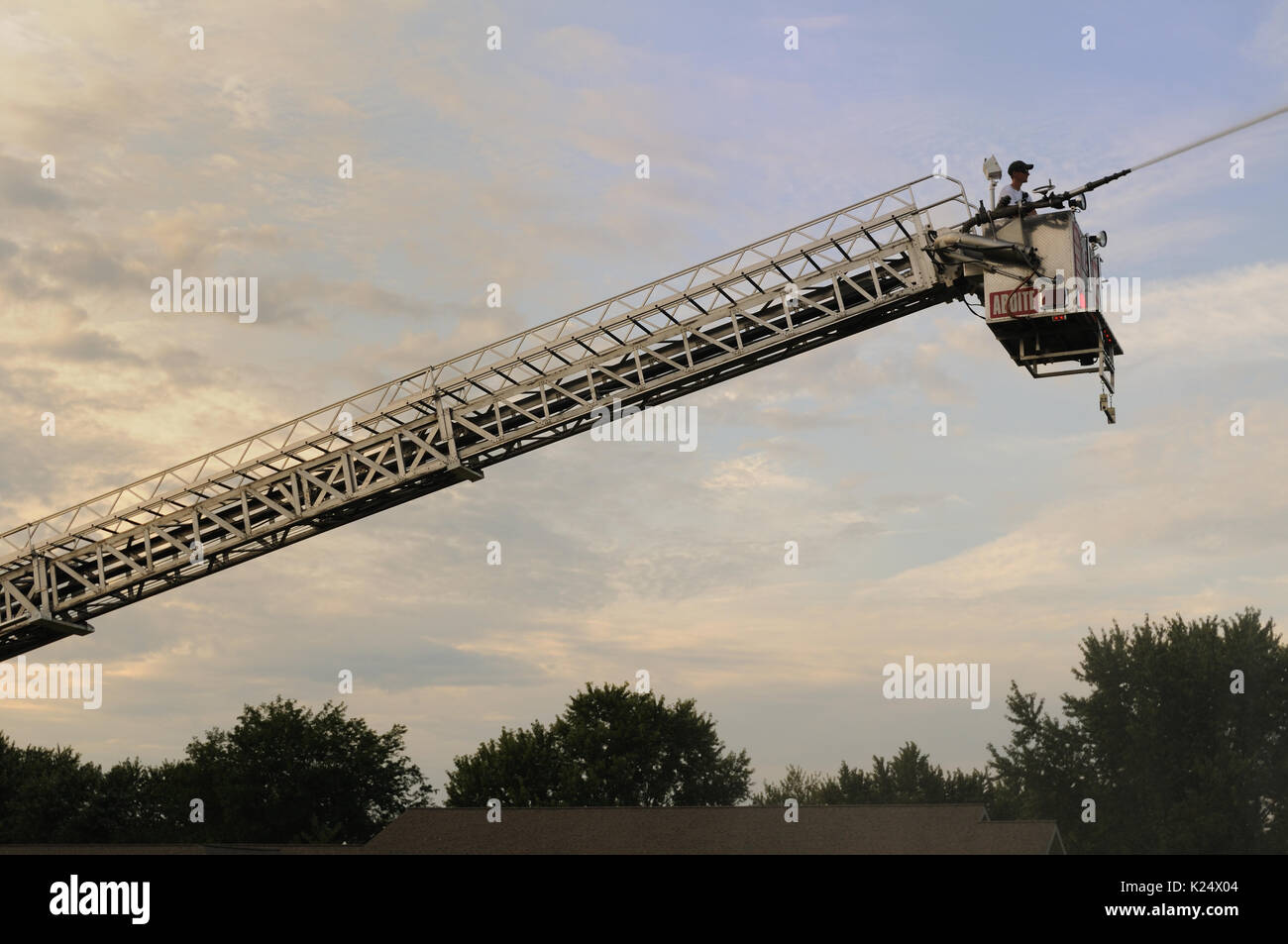 Fire Fighting from a ladder truck Stock Photo - Alamy