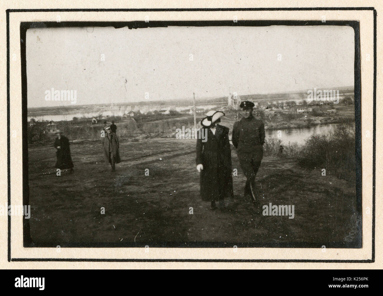 German officers walking with women Stock Photo - Alamy