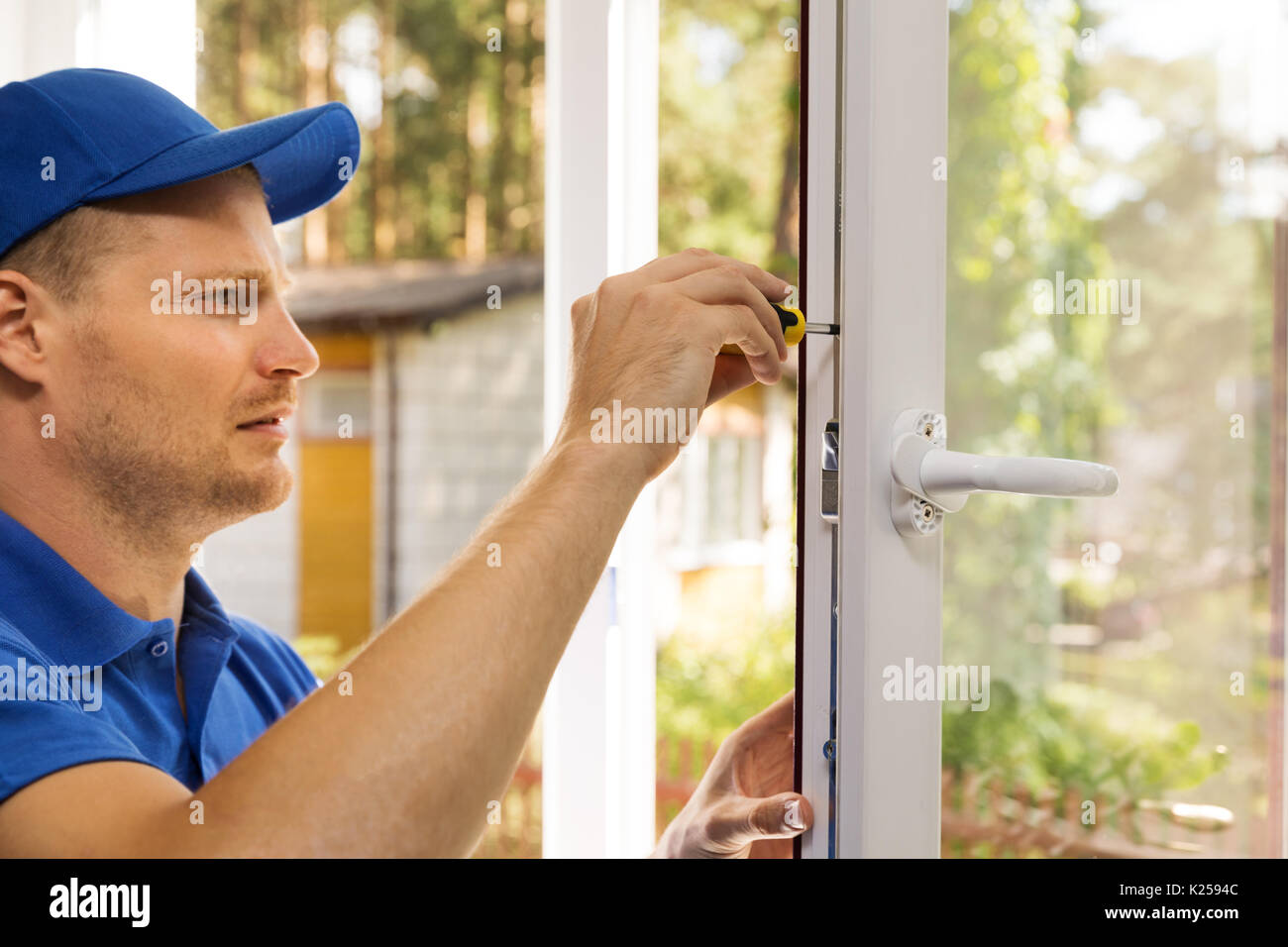 plastic window installation and maintenance service Stock Photo - Alamy