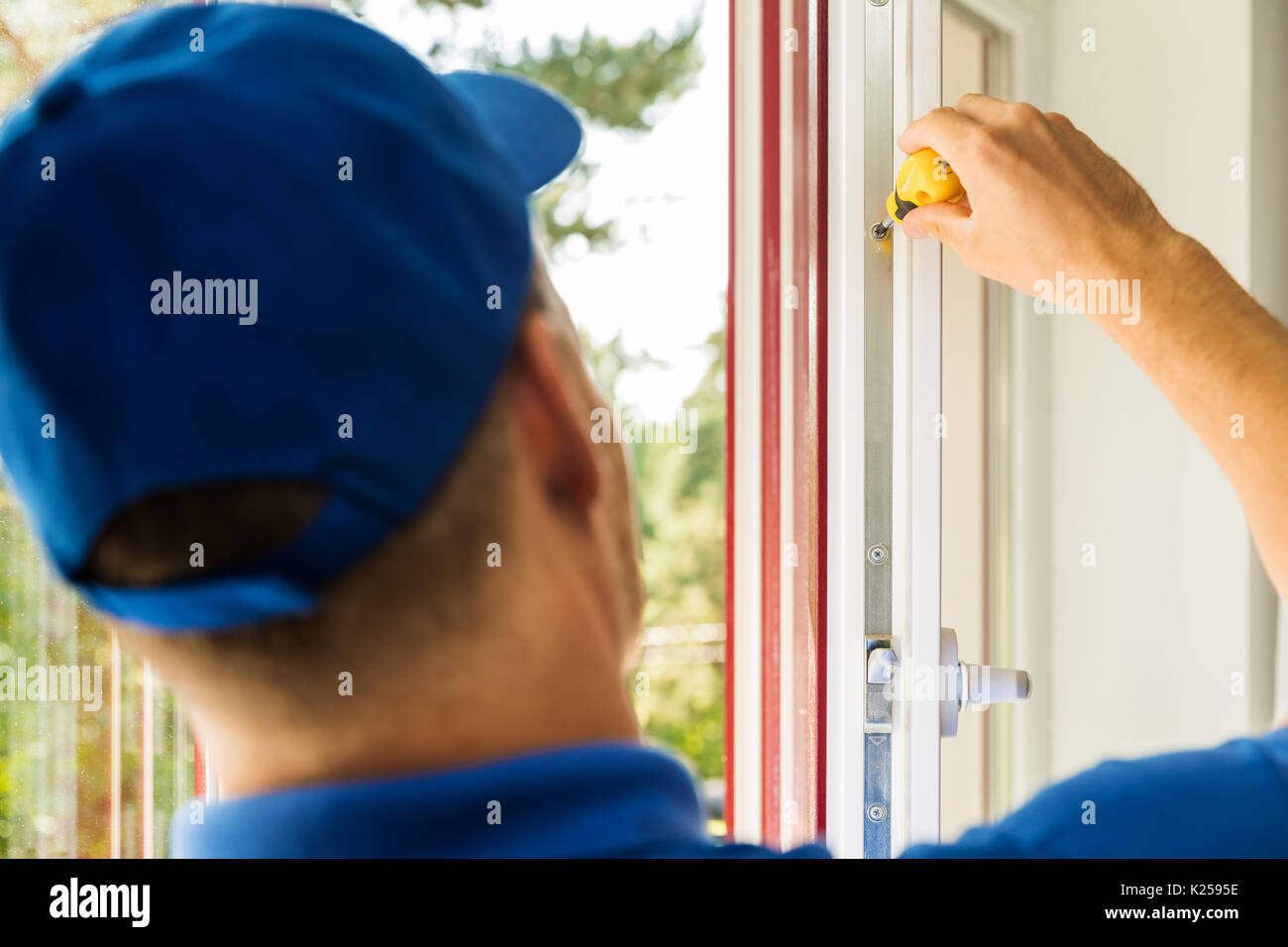 plastic pvc window maintenance service Stock Photo - Alamy