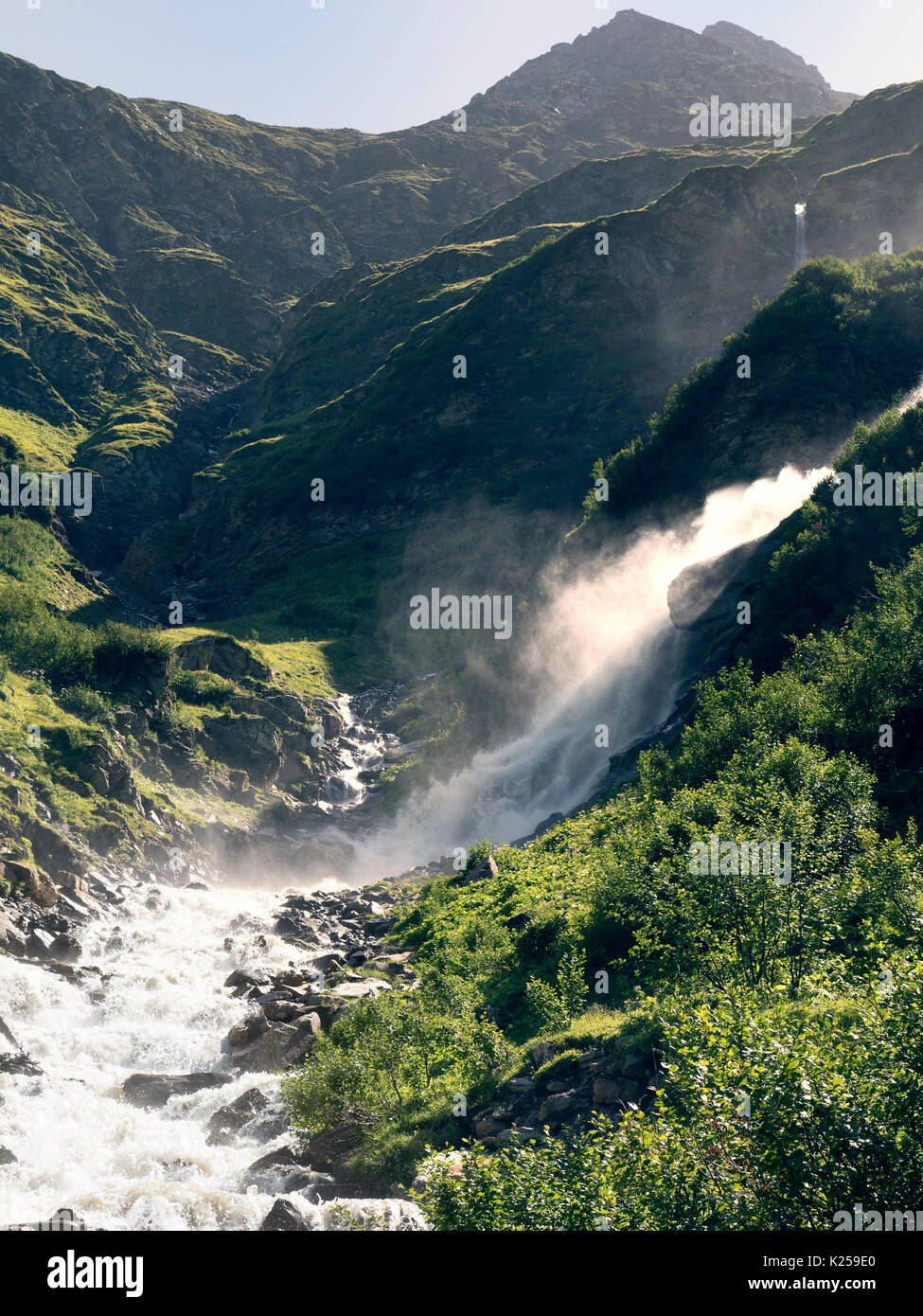 Mountain waterfall in Alps. Scenic Alpine rocky alpine mountines of ...