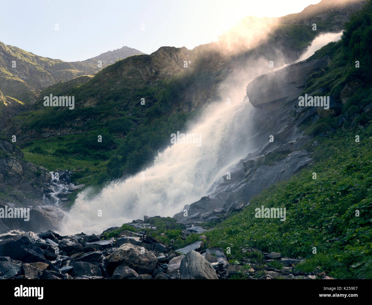 Mountain waterfall in Alps. Scenic Alpine rocky alpine mountines of ...