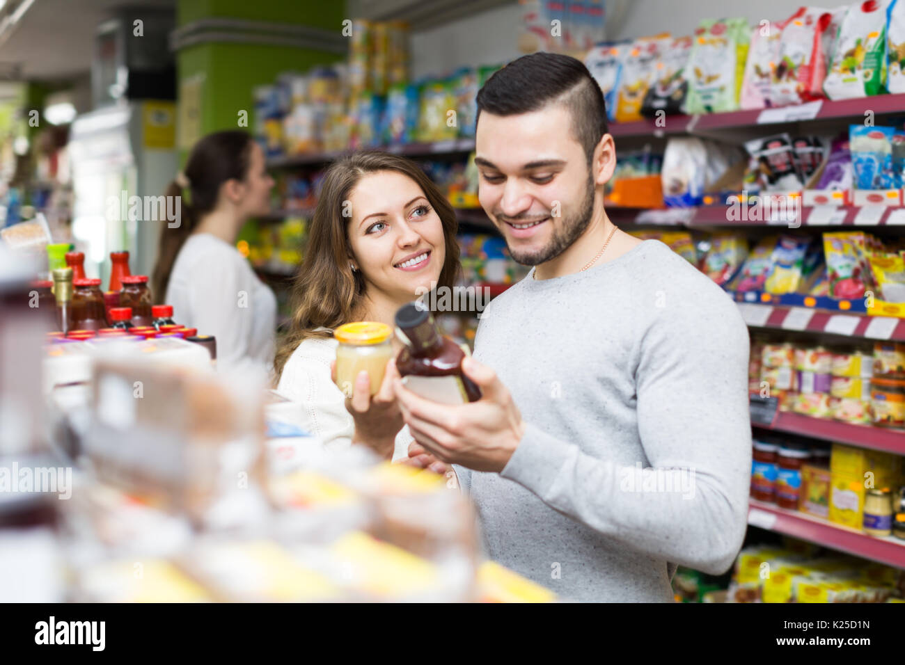 People purchasing the food for week in supermarket Stock Photo - Alamy