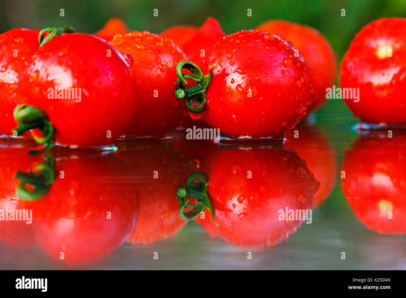 Ripe tasty red tomatoes dropped hi-res stock photography and images - Alamy