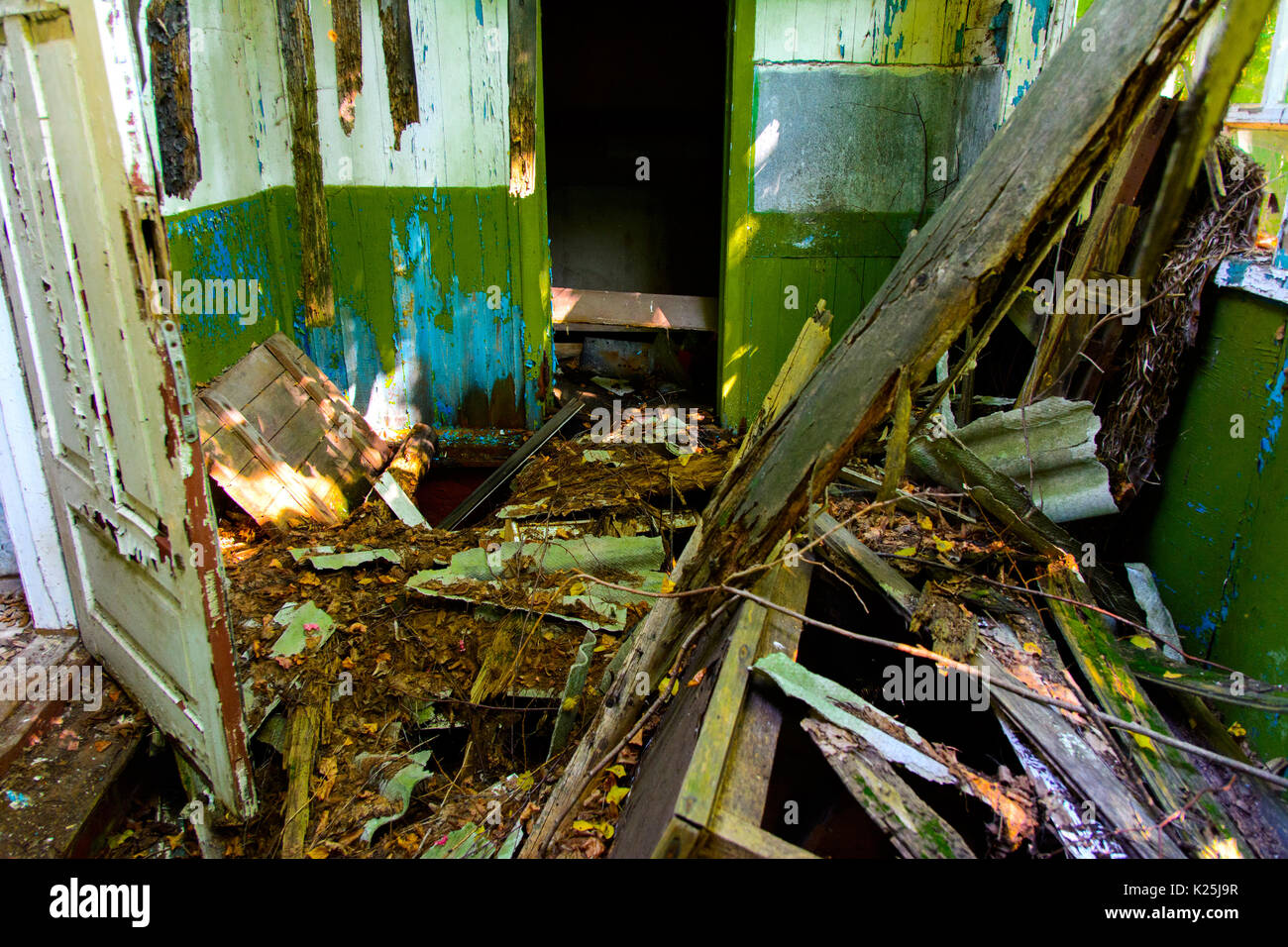 Destroyed houses in which people lived in a dead radioactive zone ...