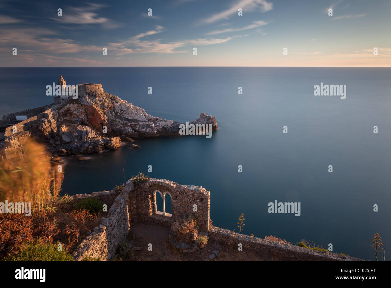 Colorful sunset from the cliff of the castle of Portovenere in Liguria ...