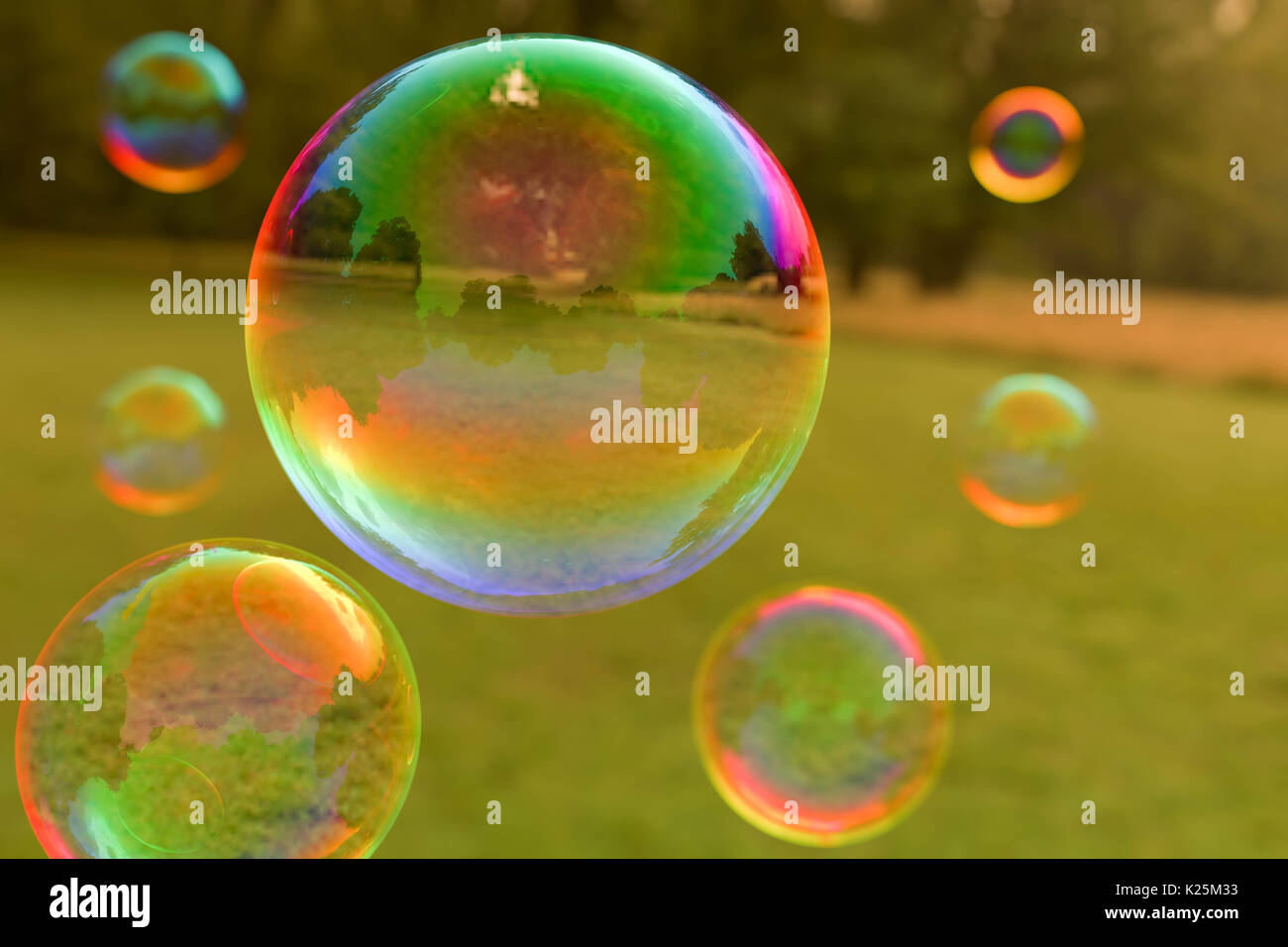 Colorful soap bubbles floating through the air Stock Photo - Alamy