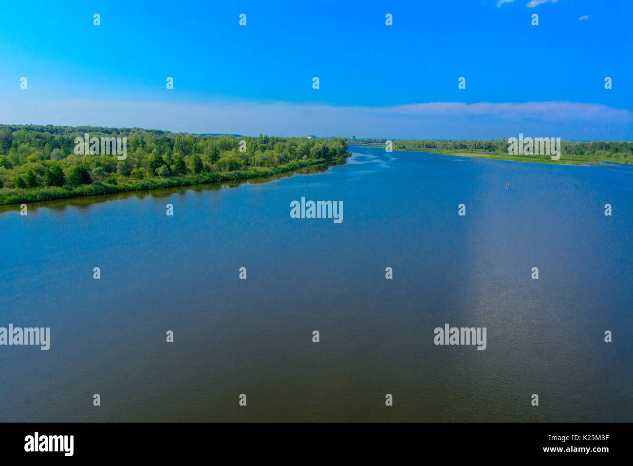 A beautiful river landscape and trees in a dead radioactive zone ...