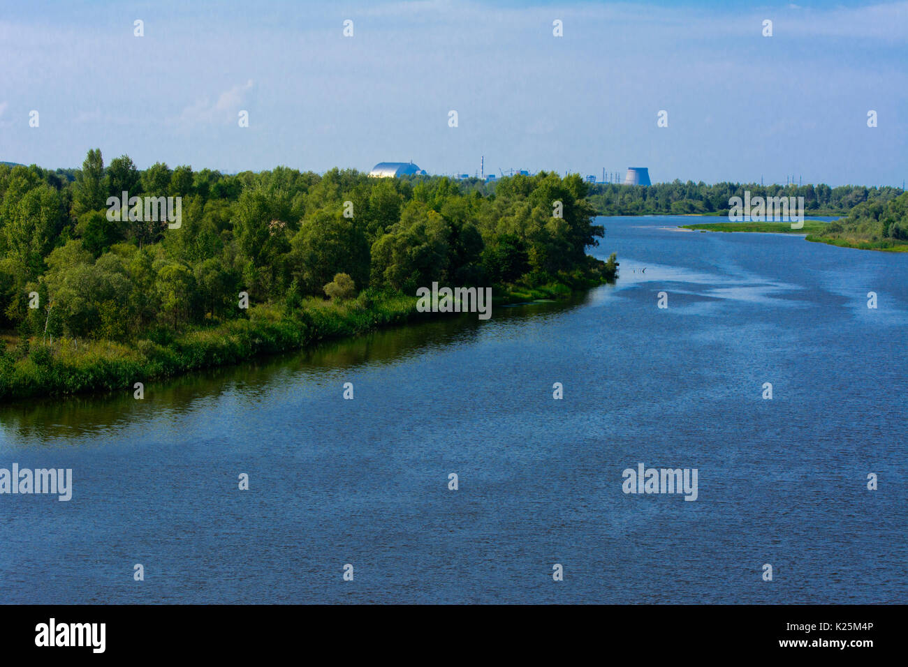 A beautiful river landscape and trees in a dead radioactive zone ...