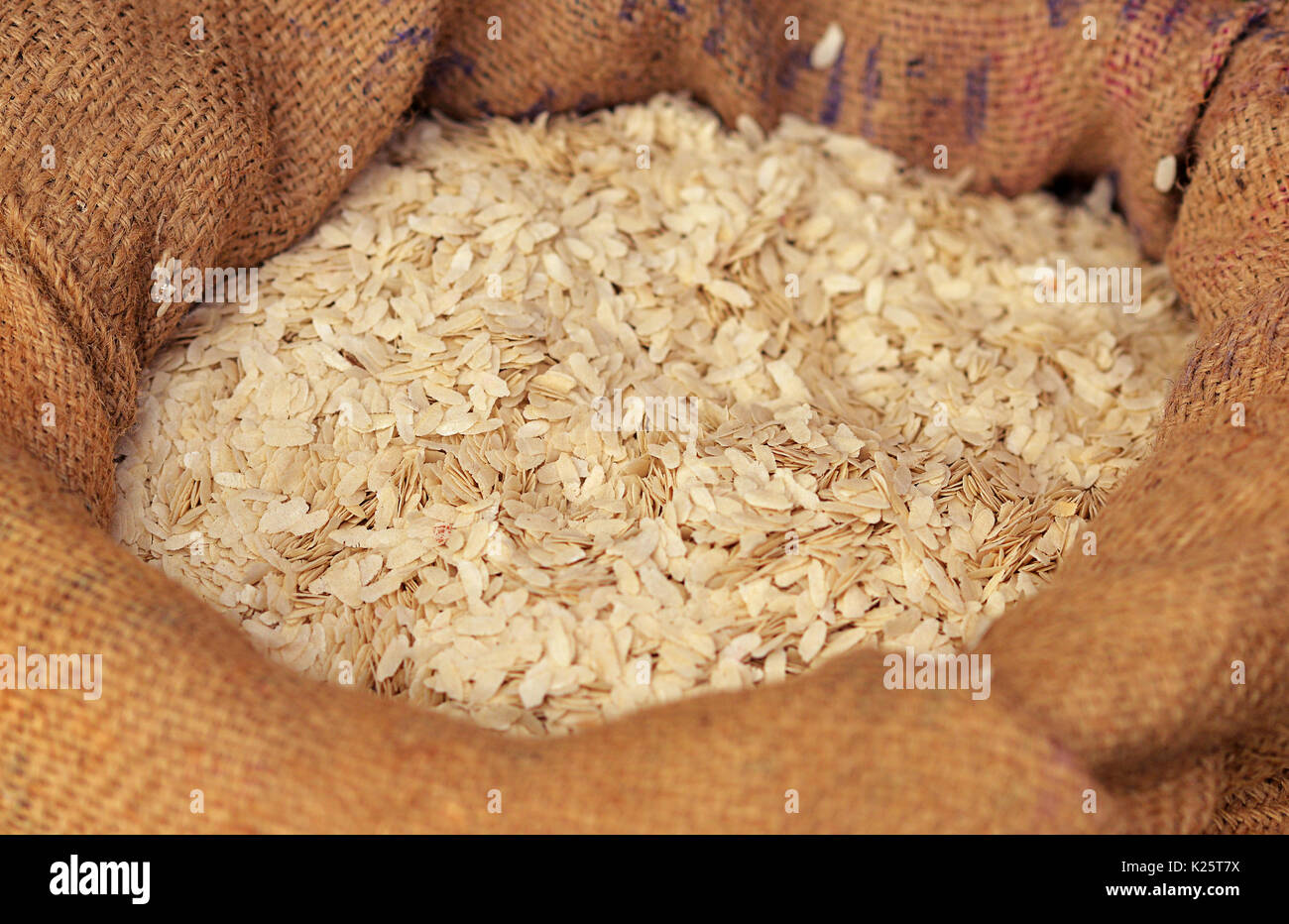 A pile of white rice in sack Stock Photo - Alamy