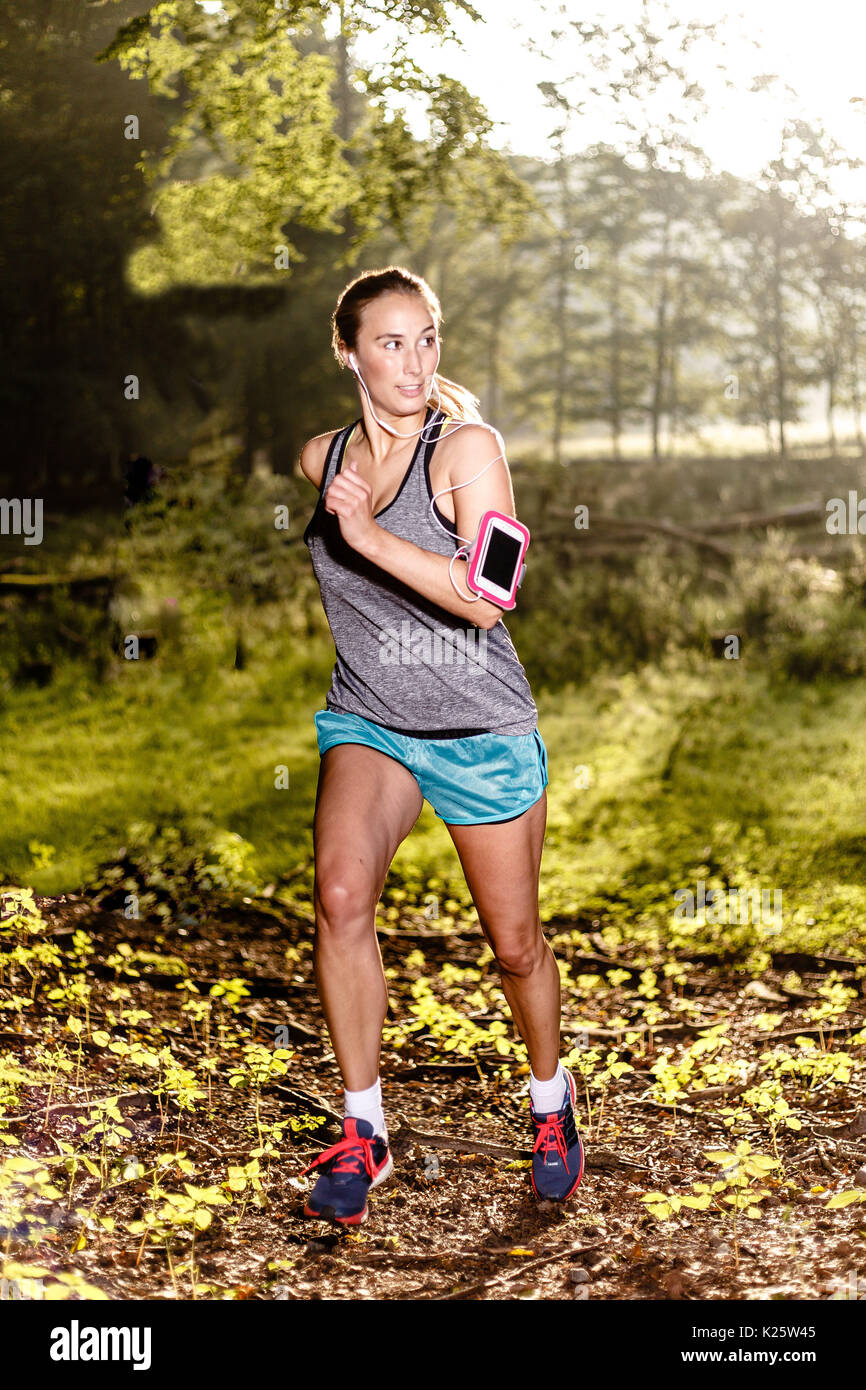 Young fitness woman runner hi-res stock photography and images - Alamy