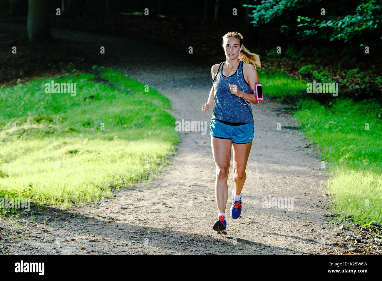 Young fitness woman runner hi-res stock photography and images - Alamy