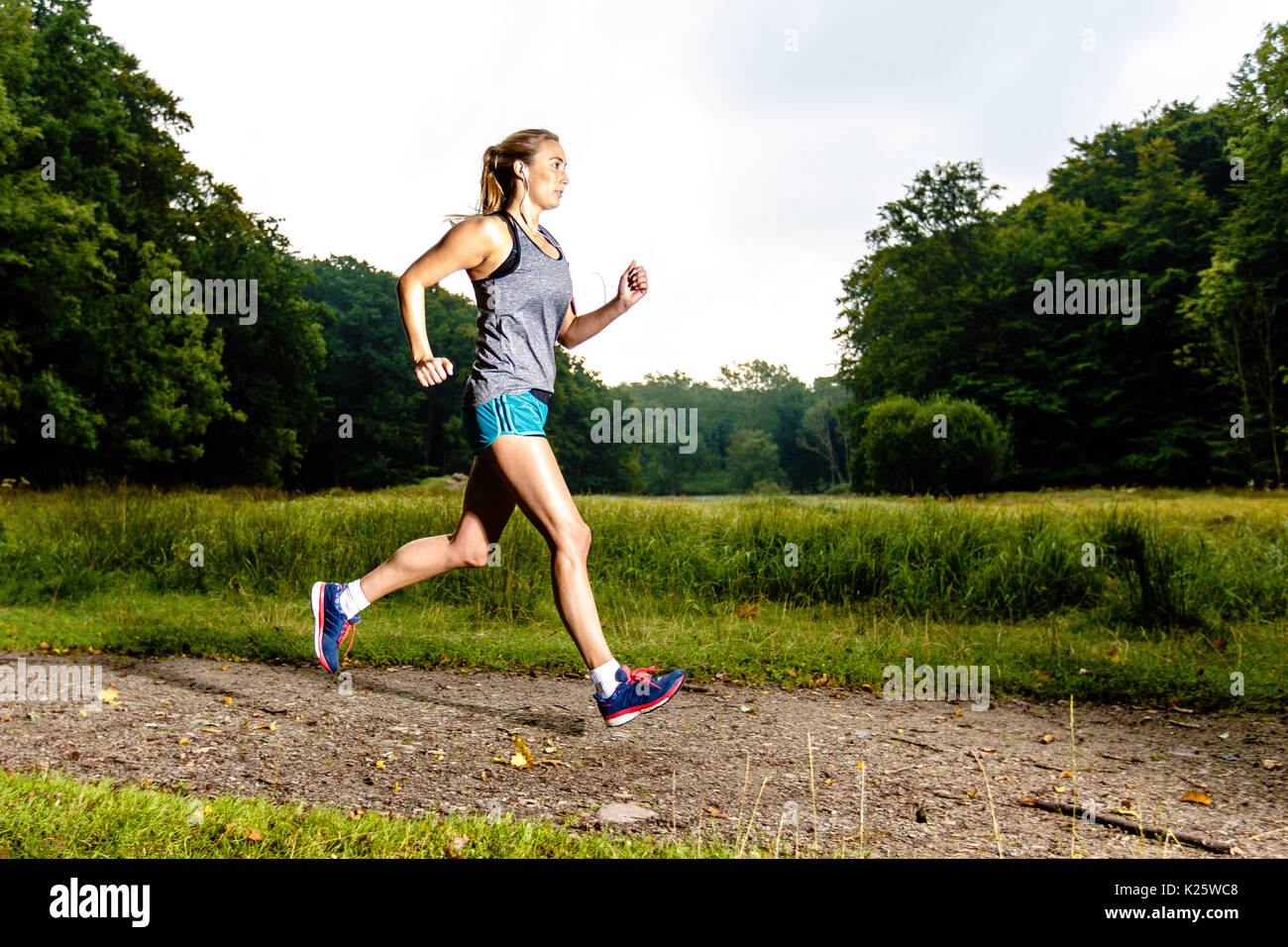Young fitness woman runner hi-res stock photography and images - Alamy