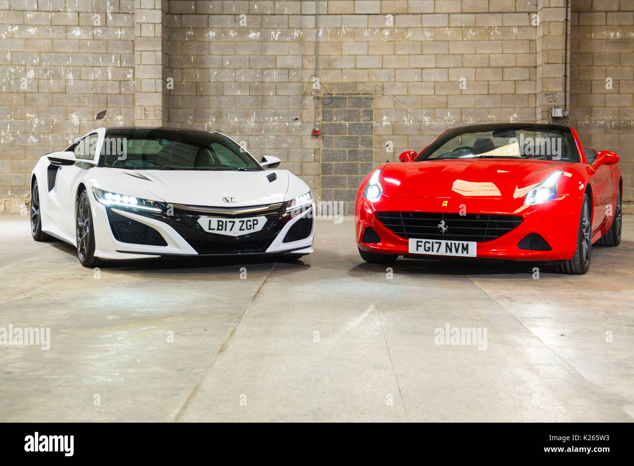 Ferrari California and Honda NSX supercars Stock Photo - Alamy
