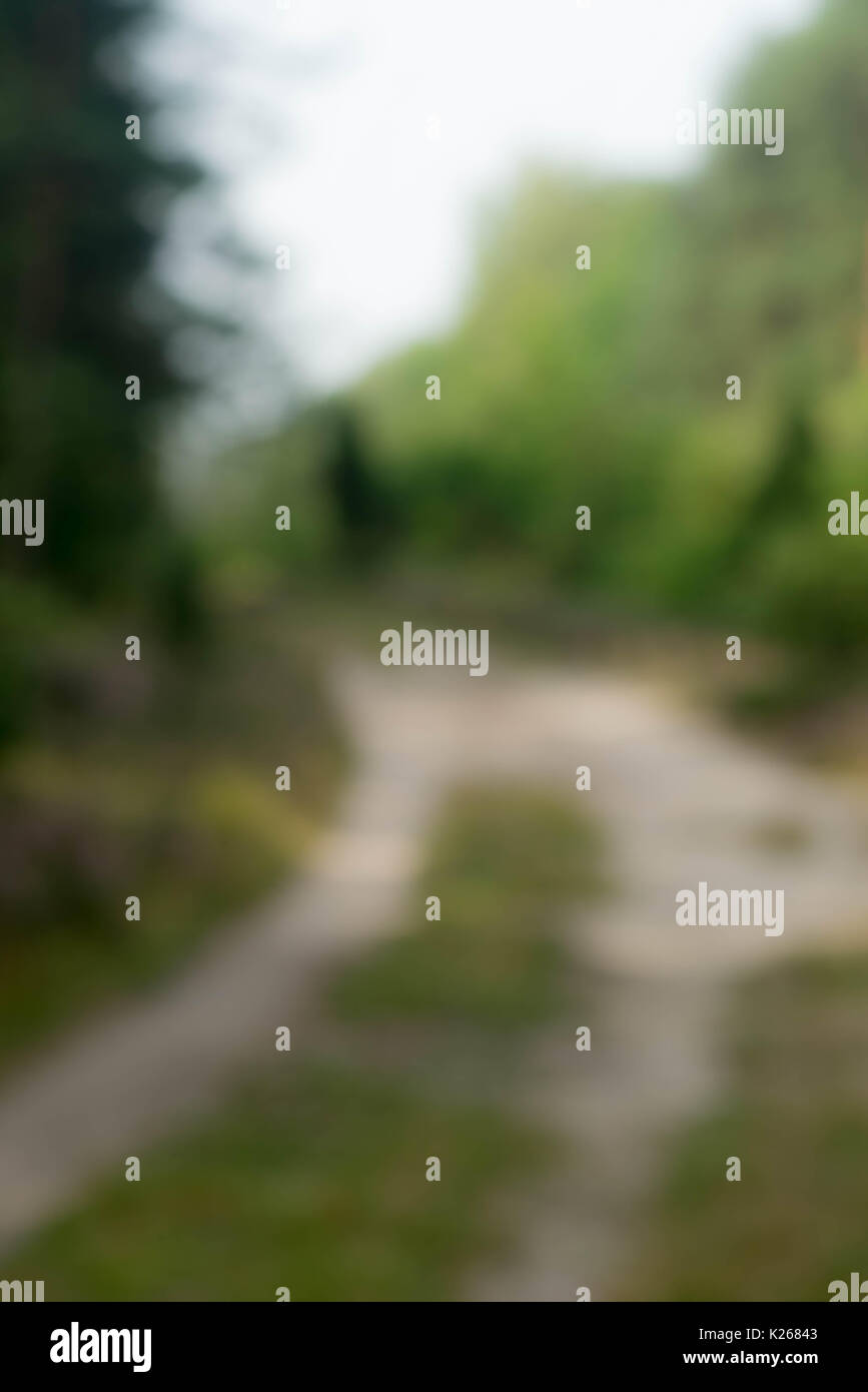 blurred summer landscape with country road Stock Photo - Alamy