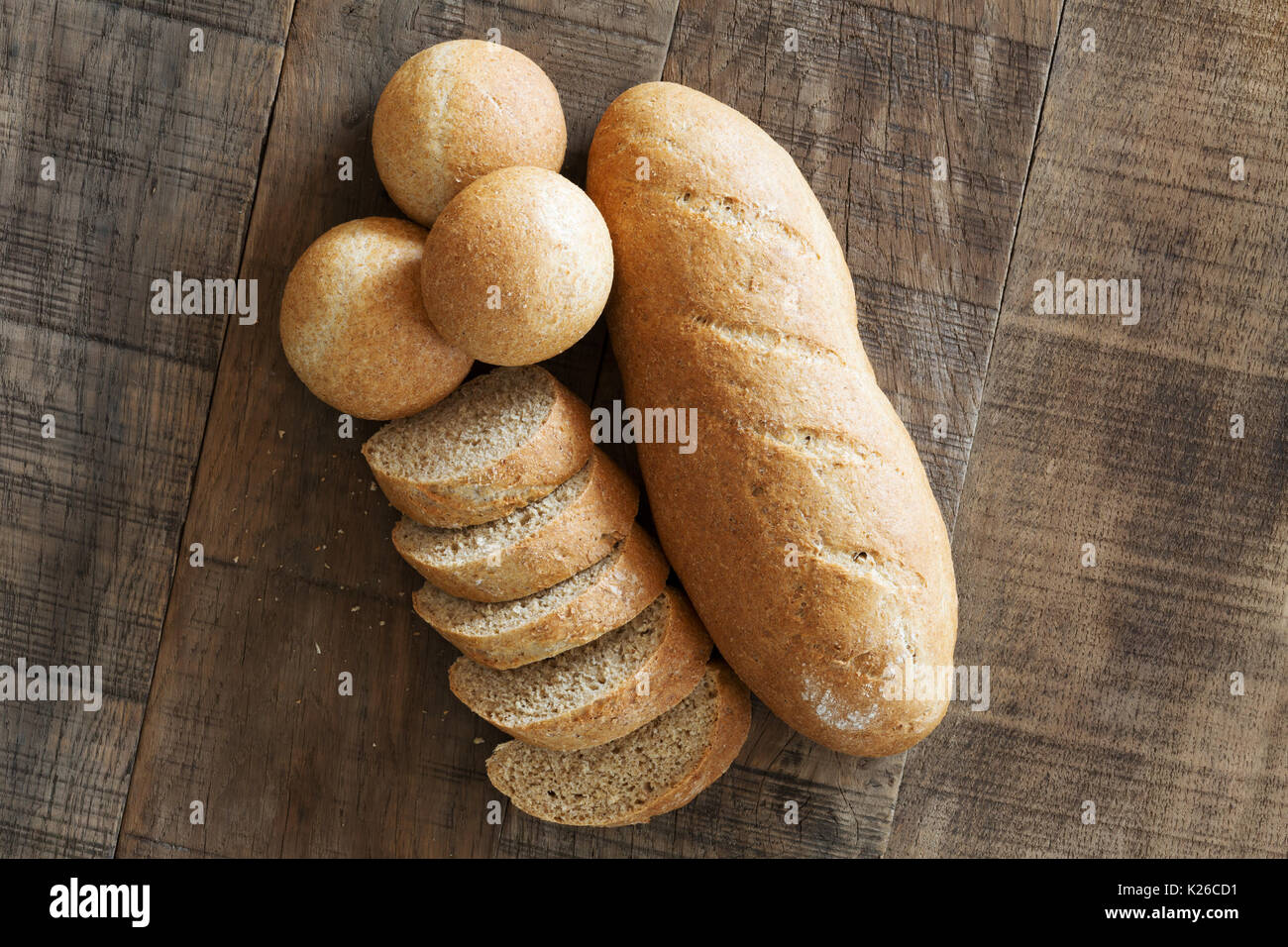 Bread rolls on a bread board Stock Photo - Alamy