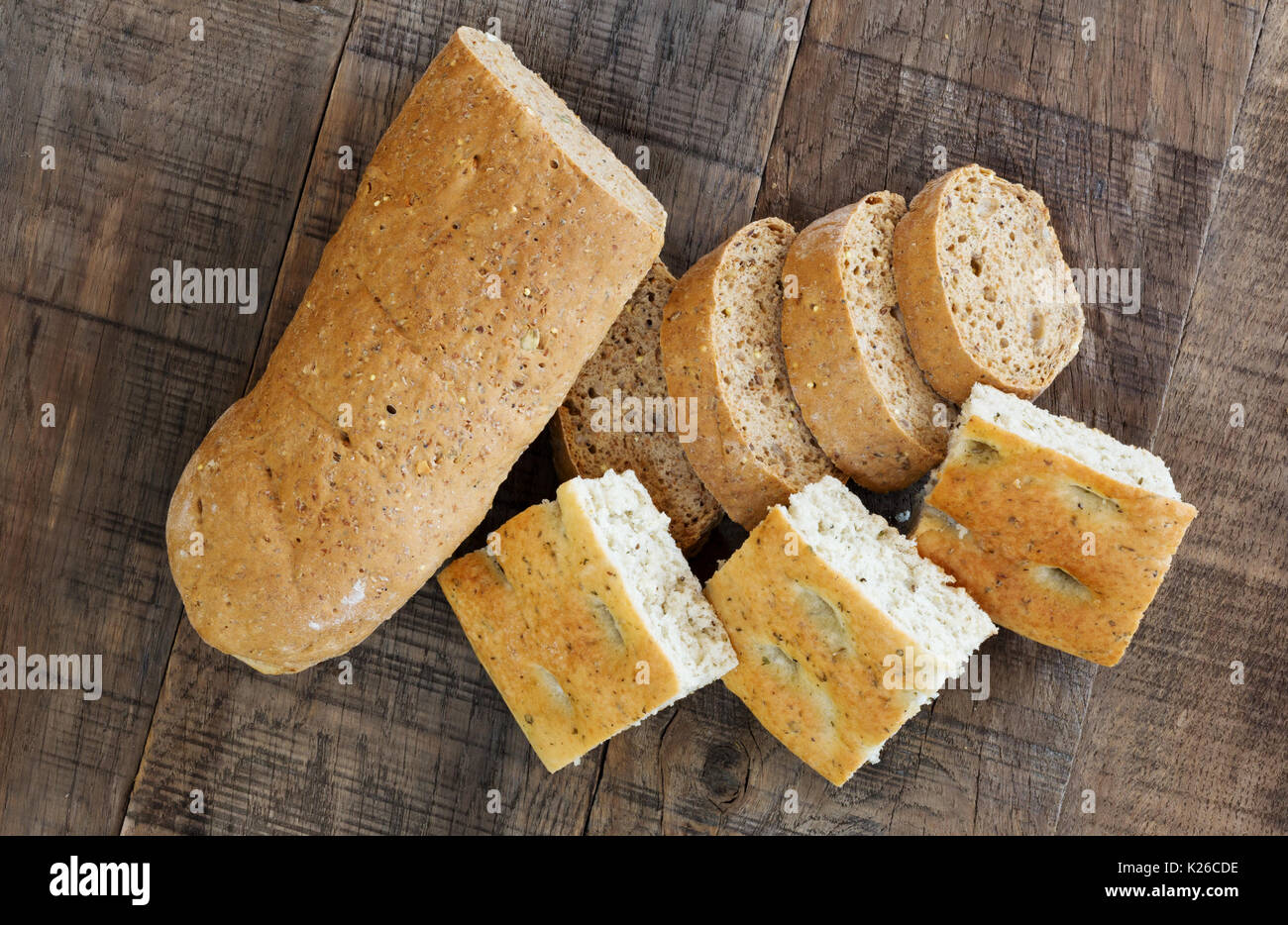 Bread rolls on a bread board Stock Photo - Alamy