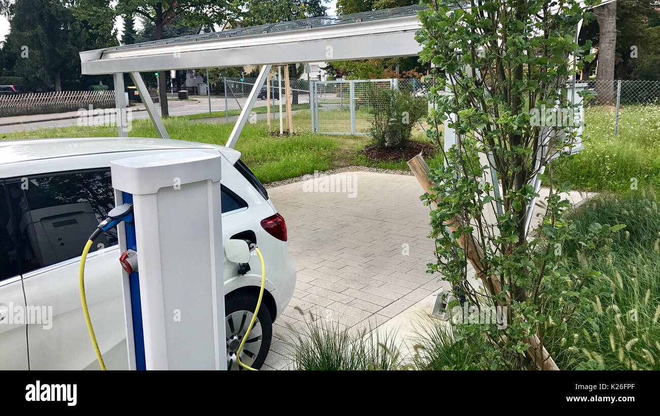 electric car being charged Stock Photo - Alamy