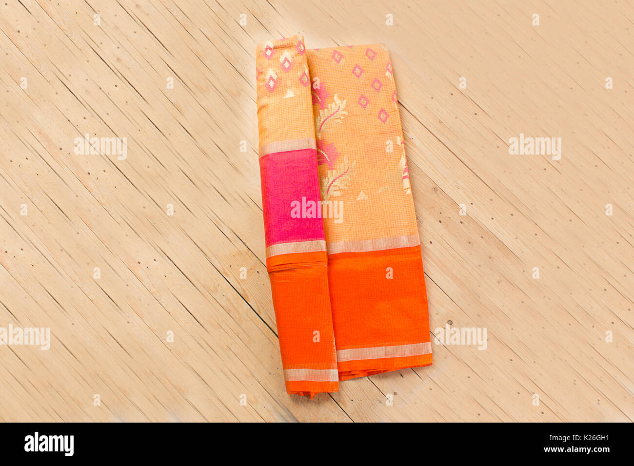 sarees placed on white background Stock Photo - Alamy