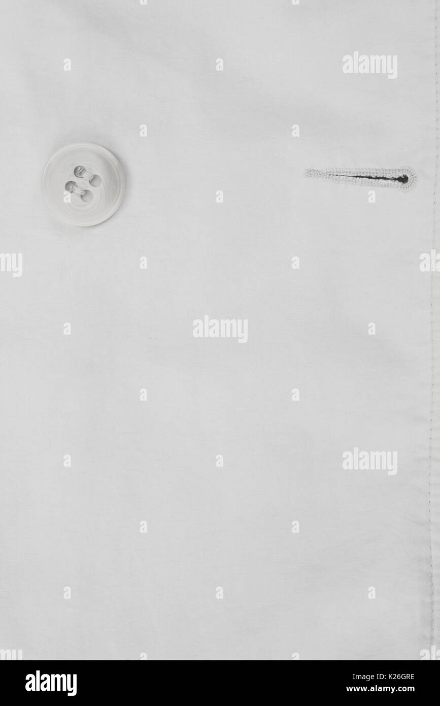 ecru fabric with button and buttonhole background texture Stock Photo ...