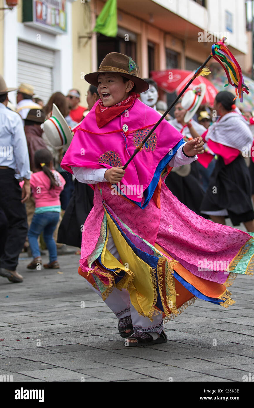 June 17, 2017 Pujili, Ecuador: young indigenous boy in bright color ...