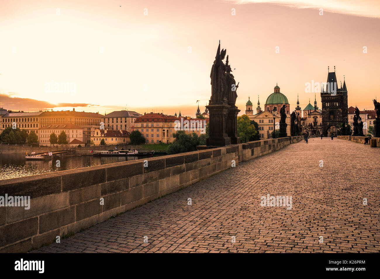 Sunset on Charles Bridge in Prague Stock Photo - Alamy