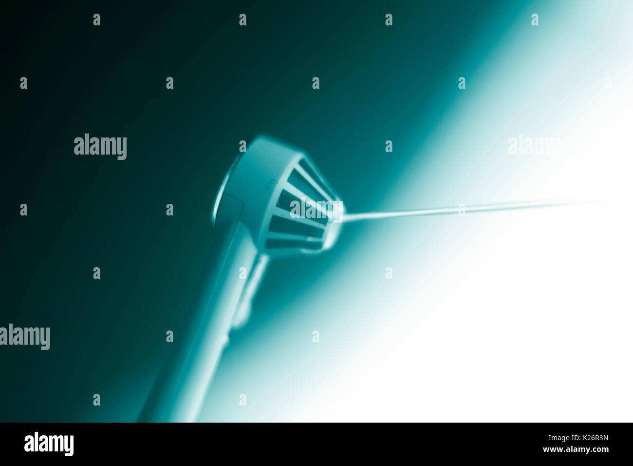 Dental water spray cleaner for interdental hygiene Stock Photo - Alamy