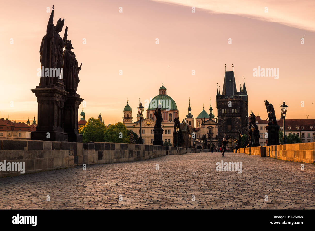 Sunset on Charles Bridge in Prague Stock Photo - Alamy