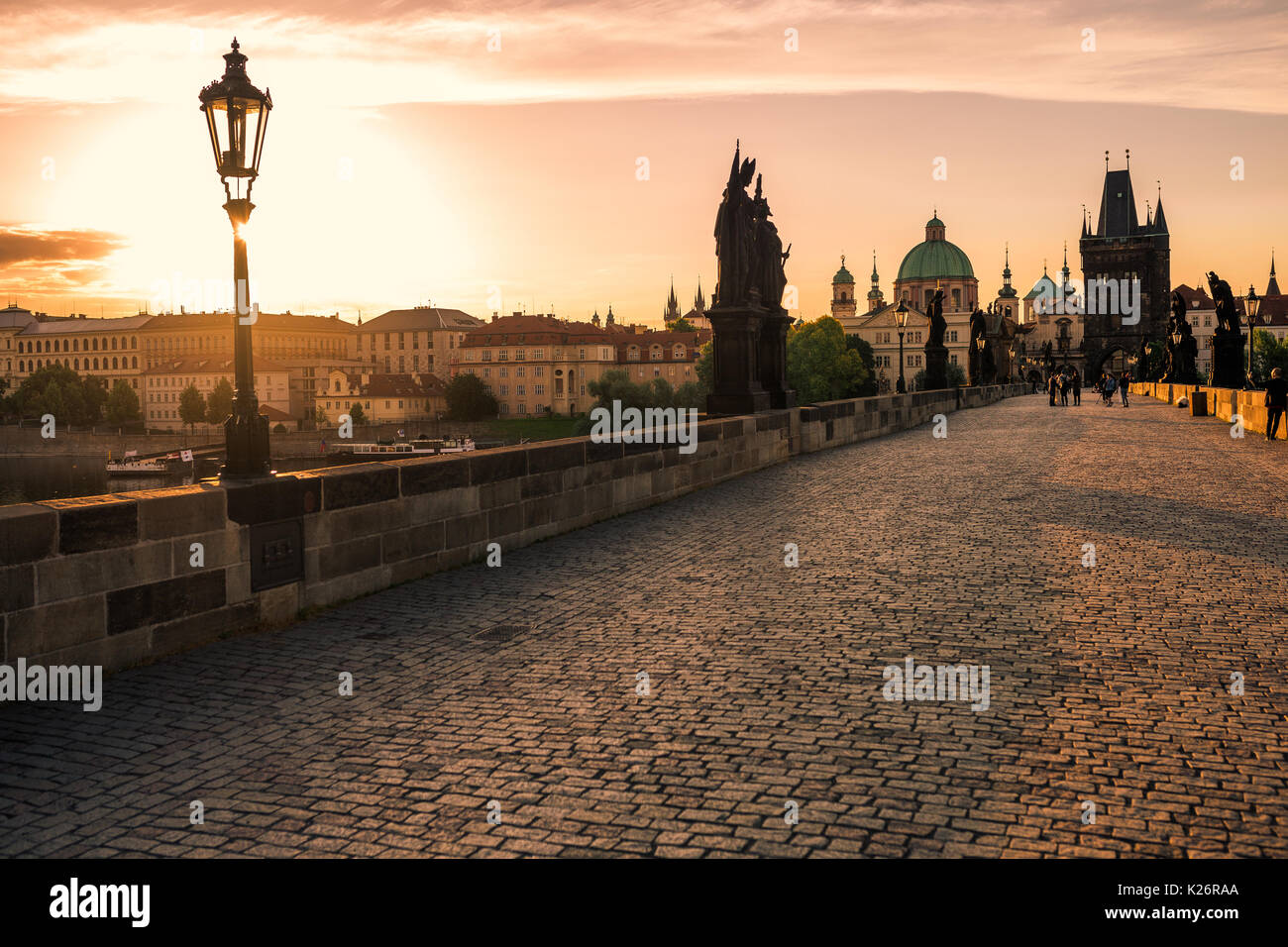 Sunset on Charles Bridge in Prague Stock Photo - Alamy