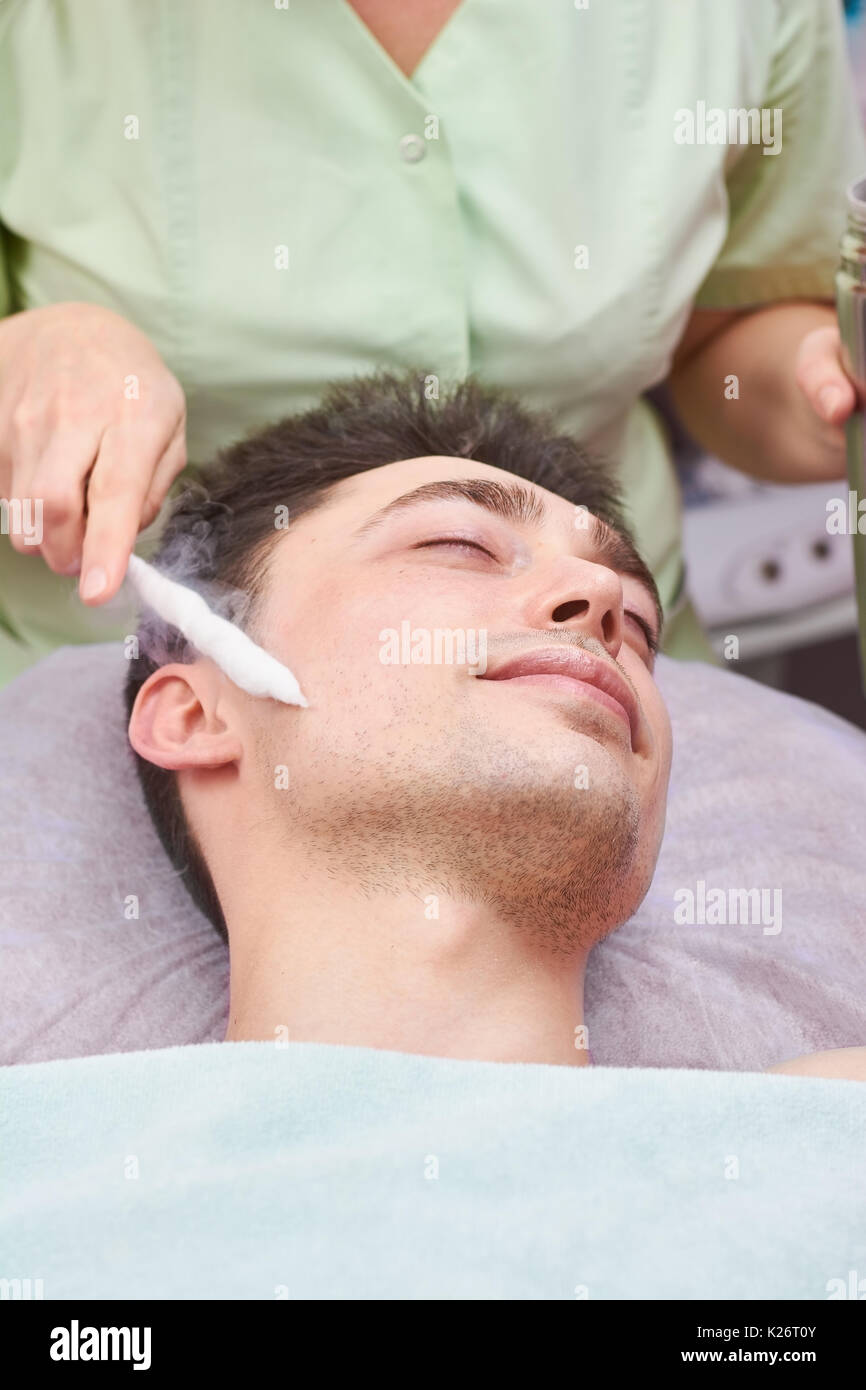 Face massage with liquid nitrogen. Skin therapy, male face ...