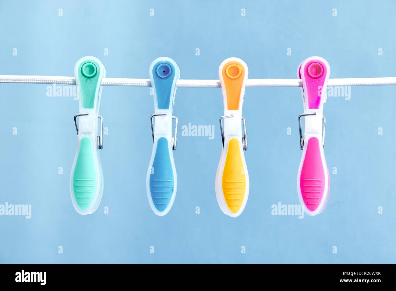 A studio photo of clothes line pegs Stock Photo - Alamy