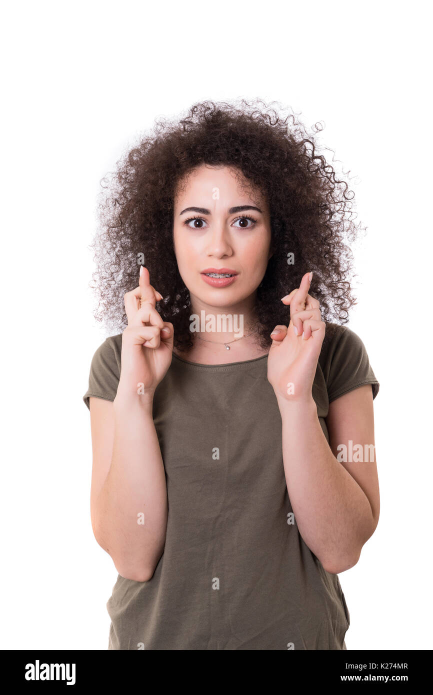 Woman with crossed fingers, isolated over a white background Stock ...