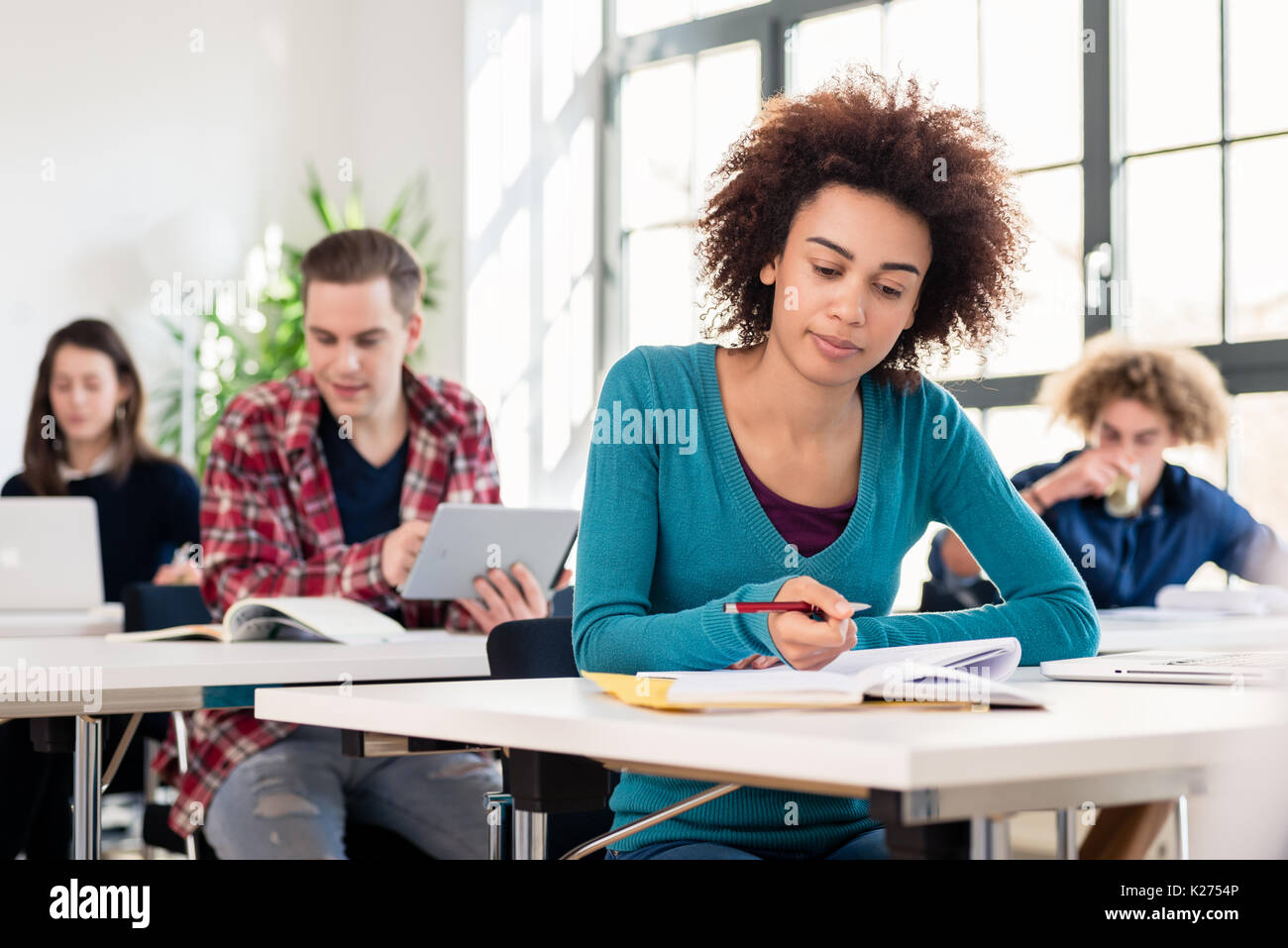 University student writing desk hi-res stock photography and images - Alamy