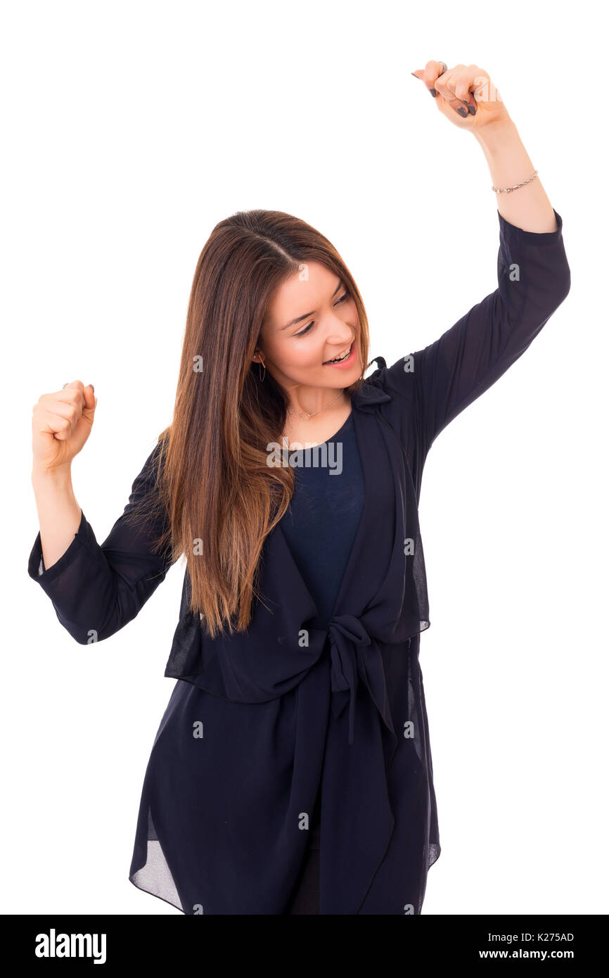 Studio shot: Happy woman with raised arms Stock Photo - Alamy