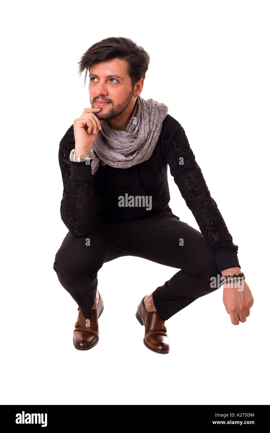 Studio picture of a young and handsome man posing isolated Stock Photo ...