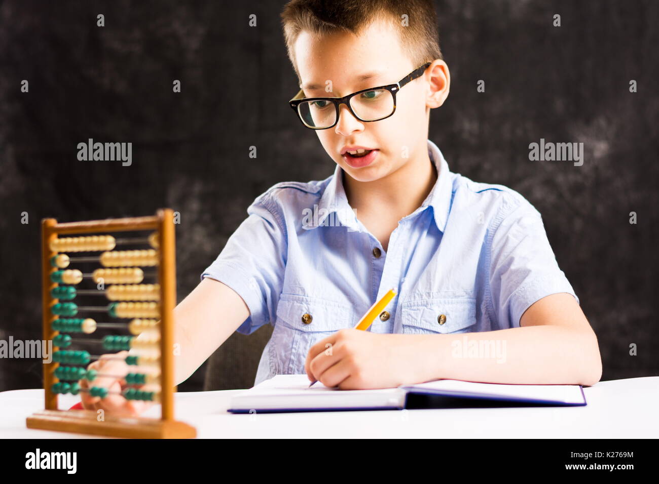 Boy doing school homework hi-res stock photography and images - Alamy