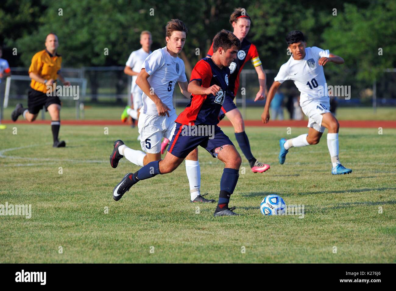 Midfielder leading an offensive rush Stock Photo - Alamy