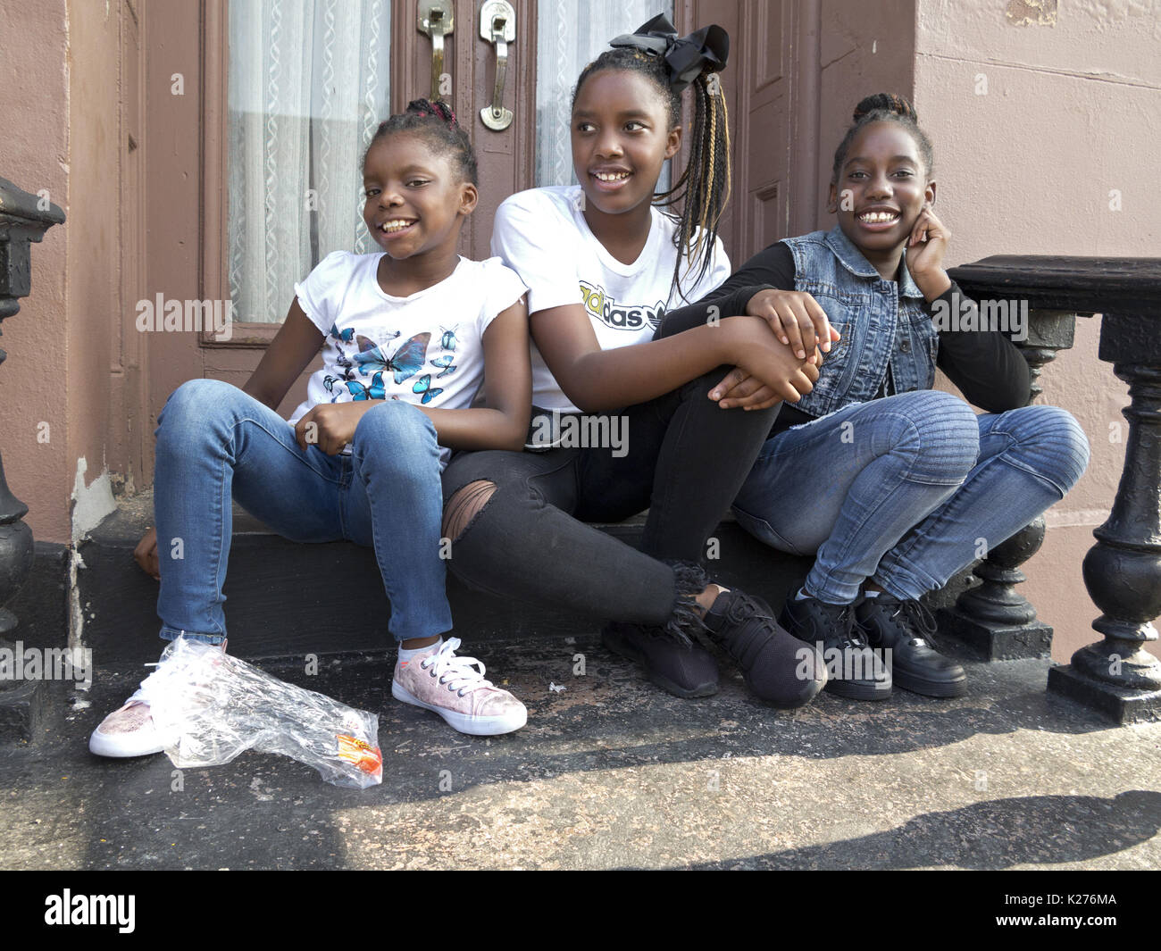 Girls on stoop in the Bedford Stuyvesant section of Brooklyn, NY, Aug ...