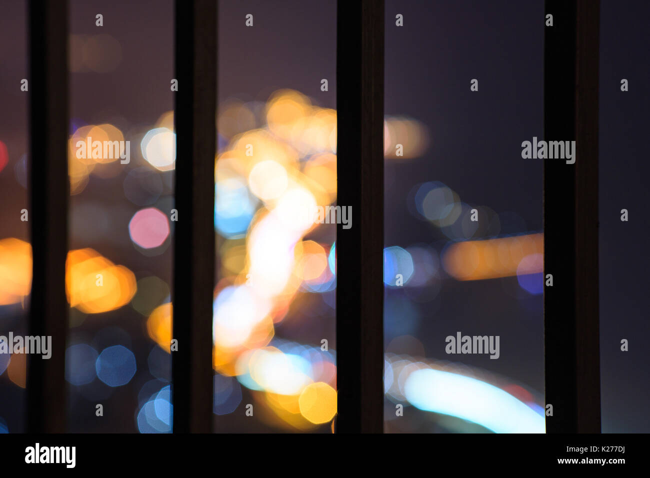 Balustrade with blur street lamp background at night Stock Photo - Alamy