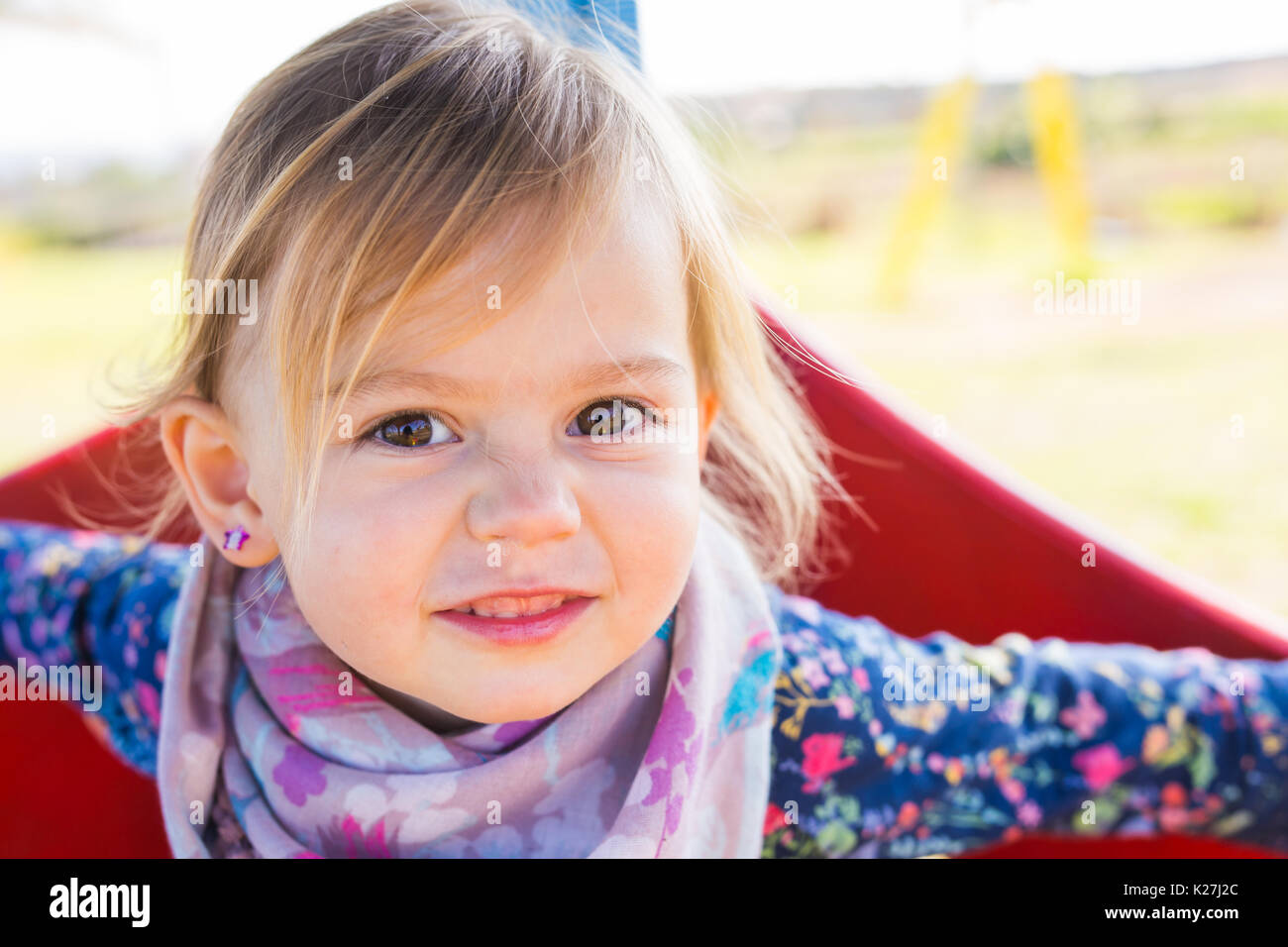 Portrait cute little girl in spring or summer day Stock Photo - Alamy
