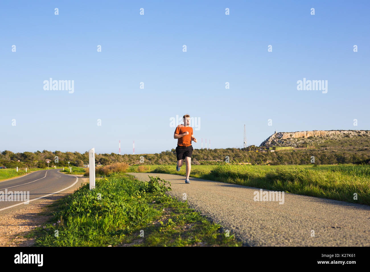 Man running outdoor sprinting for success. Male fitness runner sport ...