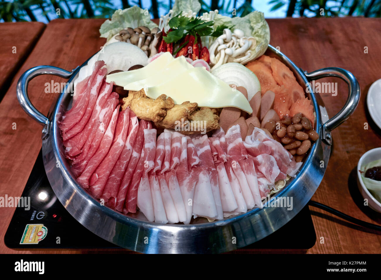 Shabu hot pot set. Japanese traditional food served raw on a hot plate ...