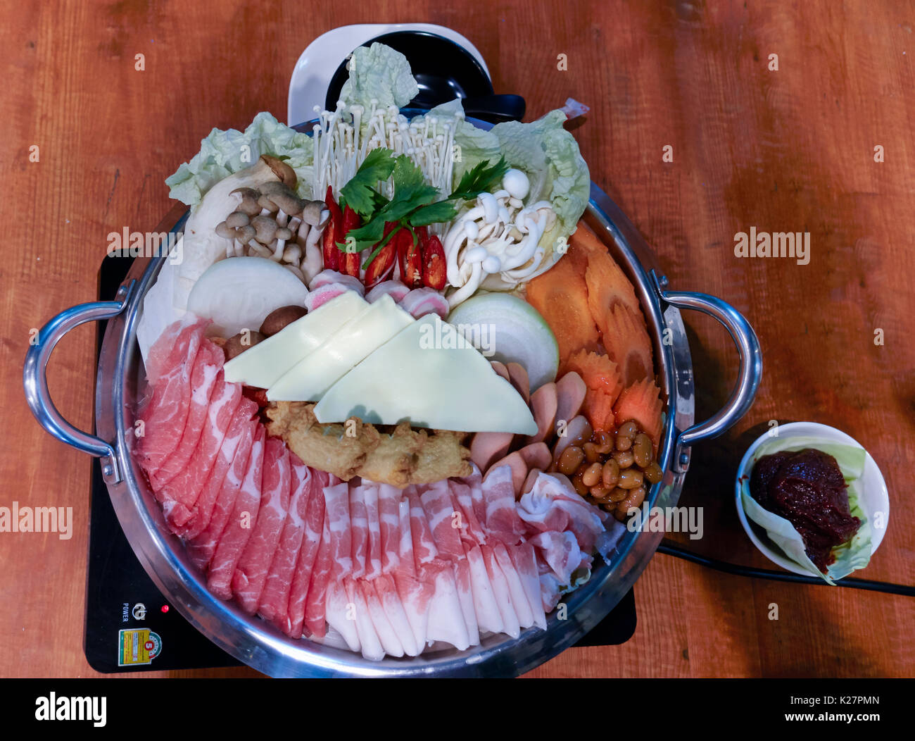 Shabu hot pot set. Japanese traditional food served raw on a hot plate ...