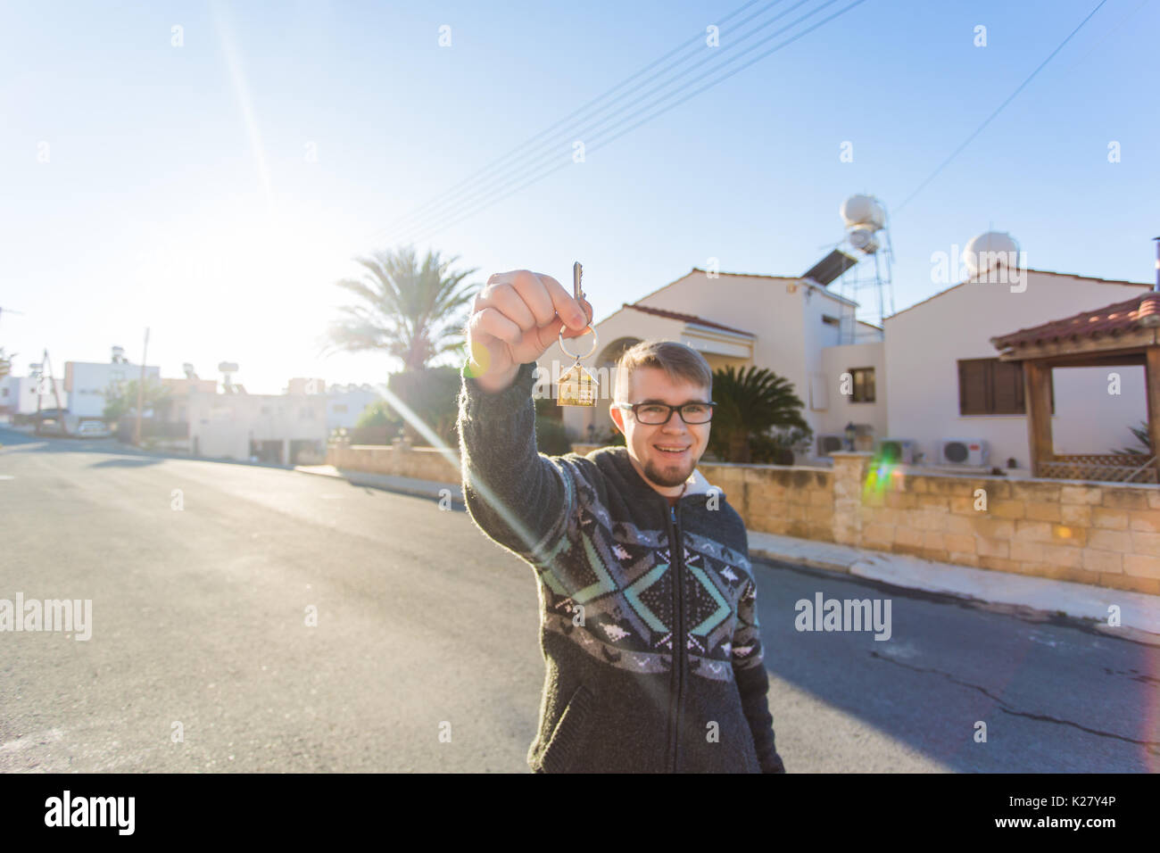 Man handing house keys shaped hi-res stock photography and images - Alamy