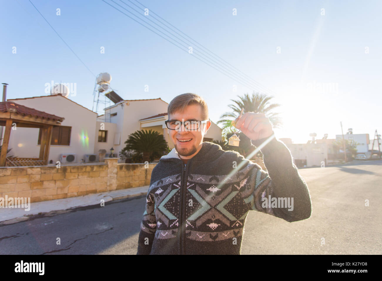 Man handing house keys shaped hi-res stock photography and images - Alamy