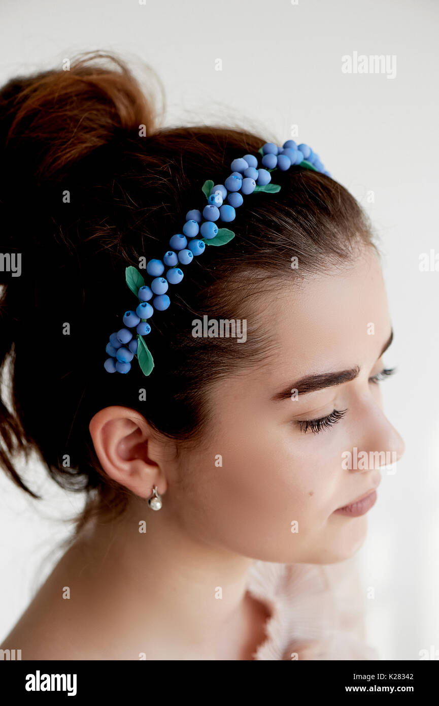Portrait of beautiful girl with dark hair and light porcelain skin ...