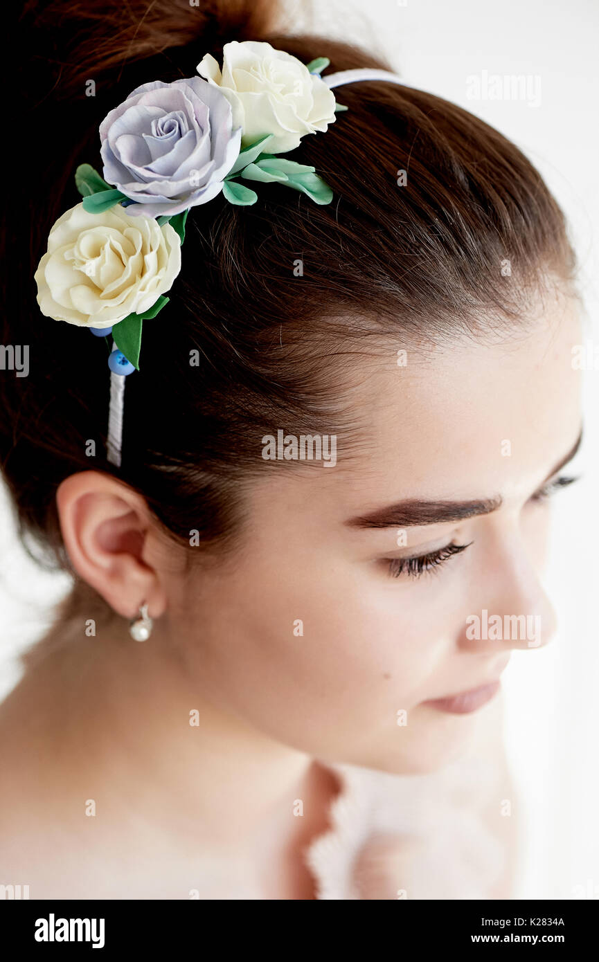 Portrait of beautiful girl with dark hair and light porcelain skin ...